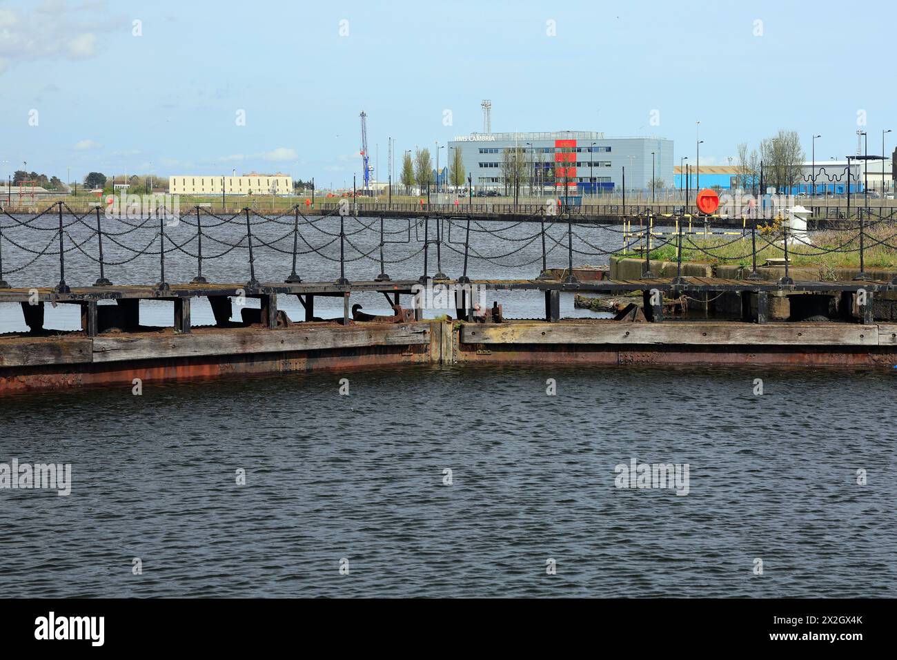 Dilapidated wooden walkway over lock gates at Roath Basin / Britannia ...