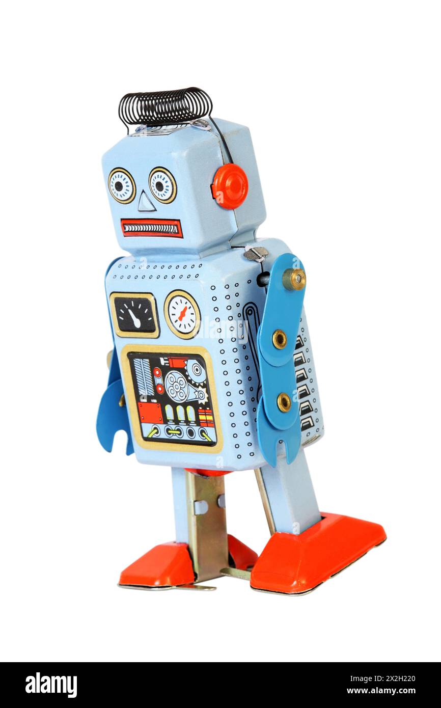 Blue retro mechanical robot toy walks isolated on white background ...