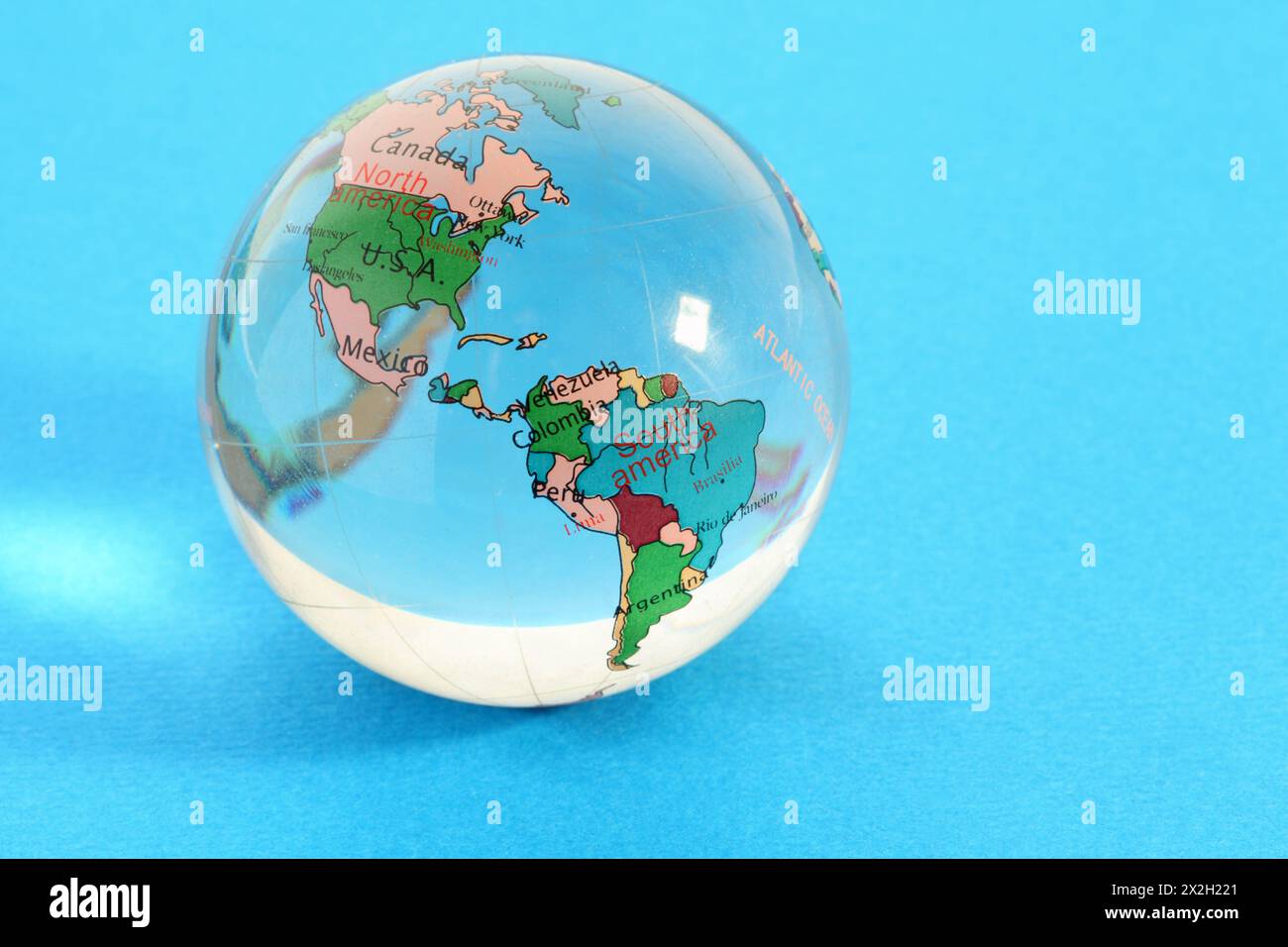Small glass globe with political map of world; North and South America ...