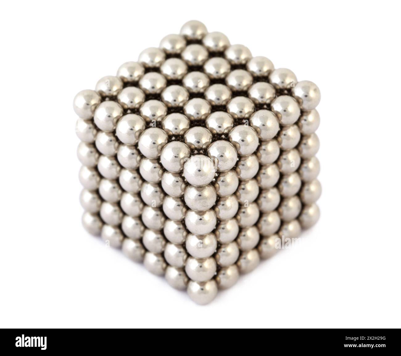 Cube assembled from little metallic balls isolated on white Stock Photo ...