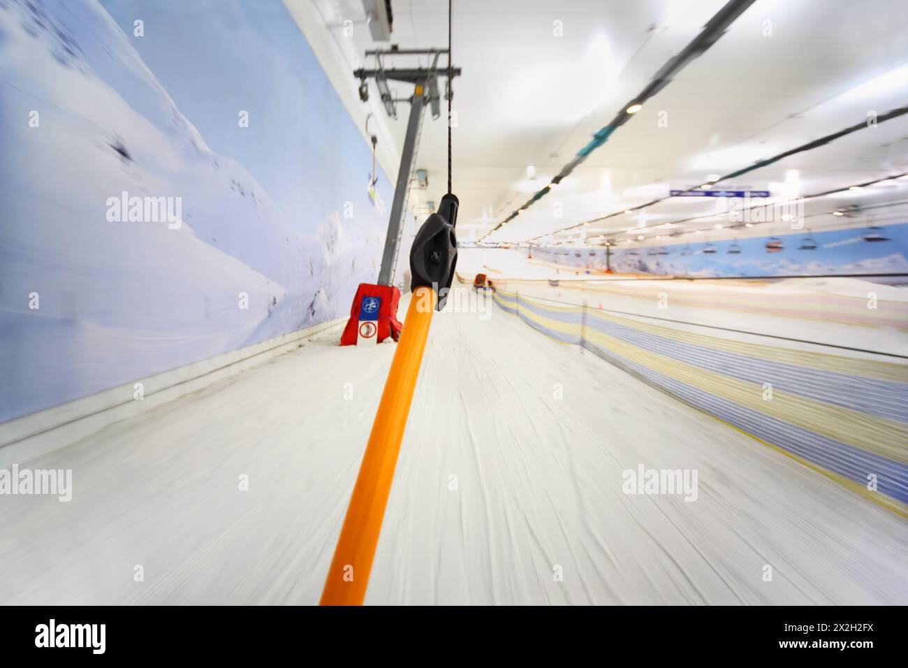 view from indoor ski funicular - going up steep mountain; high speed ...