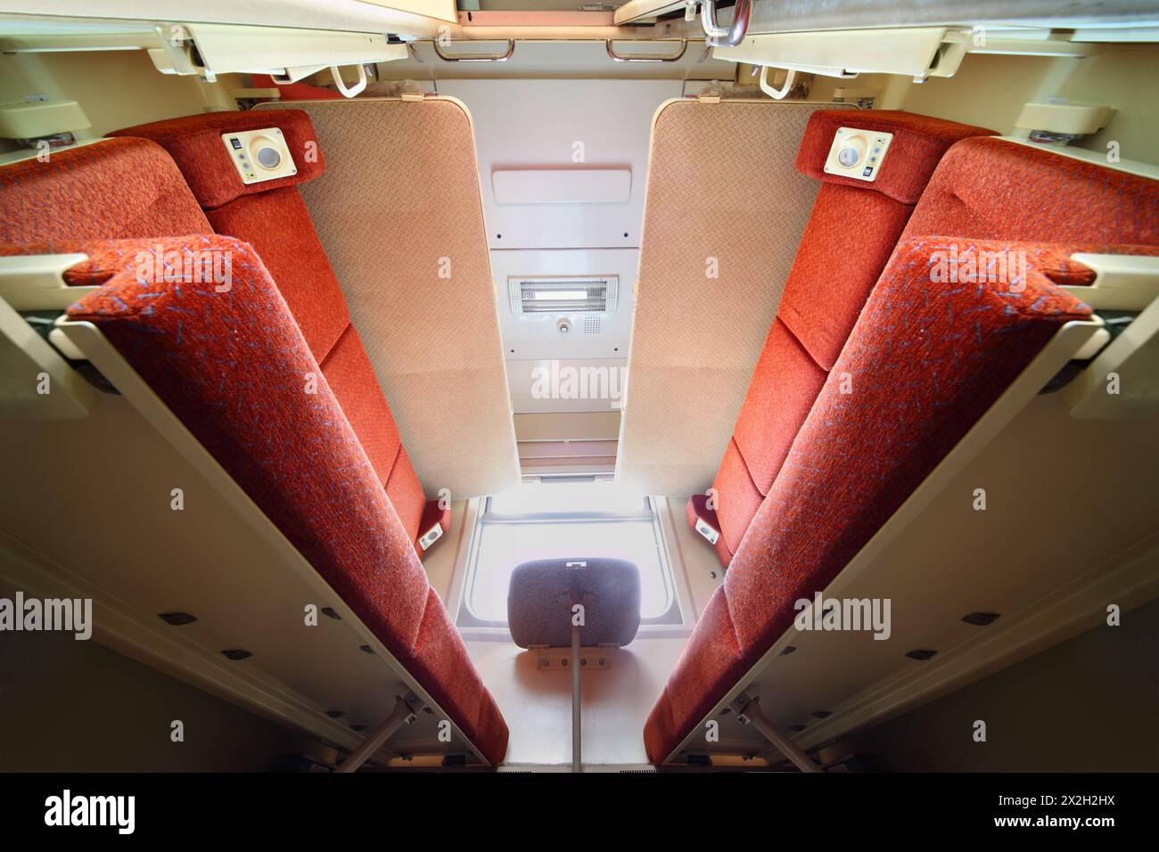 Railroad train interior. Inside of train - red seats; table and window ...