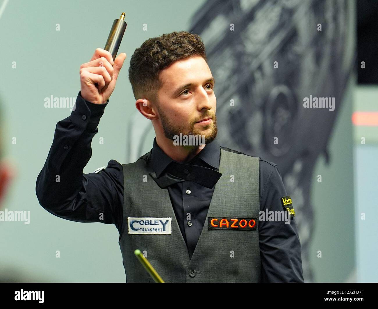 Joe O'Connor celebrates beating Mark Selby (not pictured) on day three ...