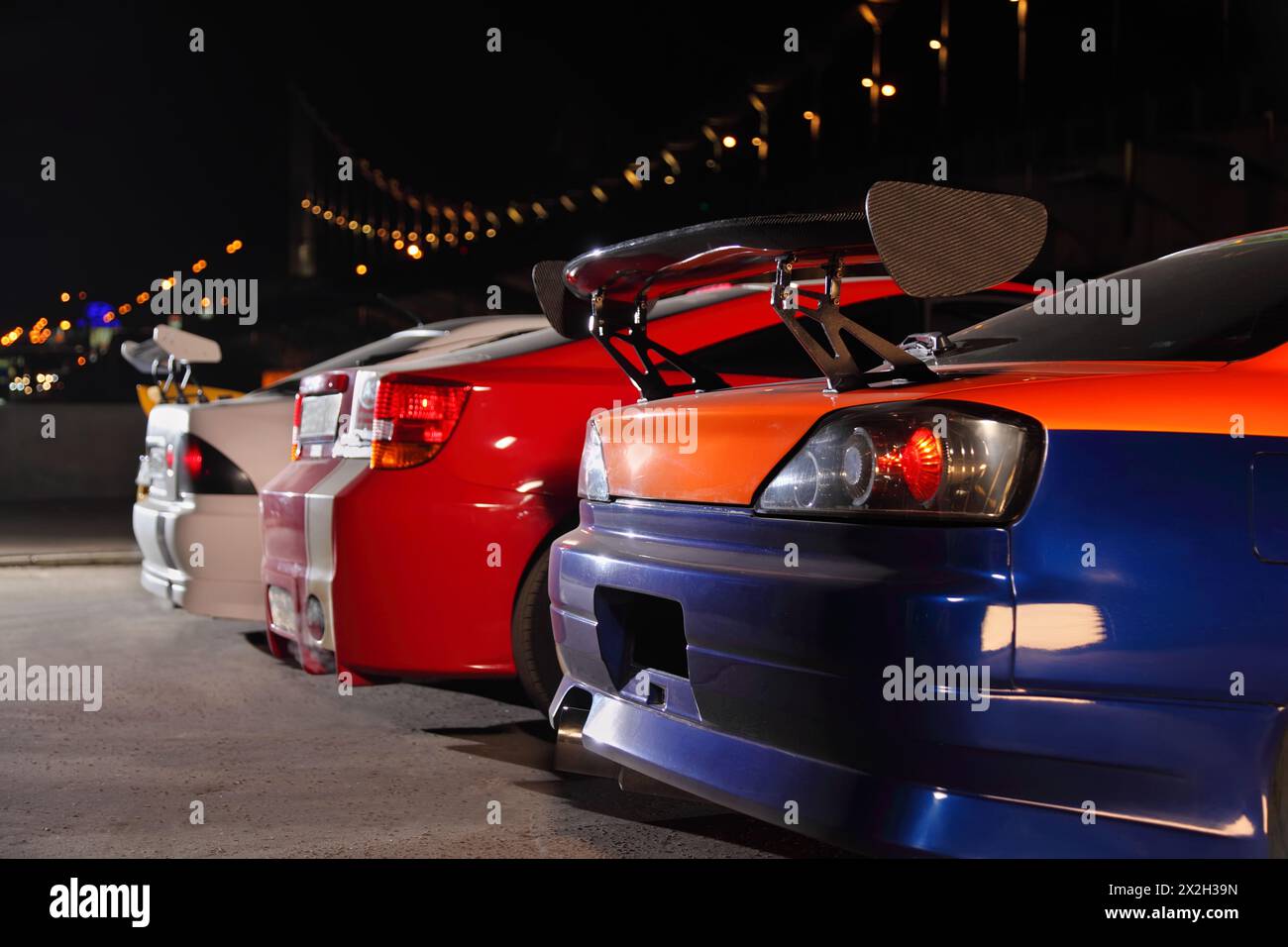 Number of multi-colored cars in parking. Bumpers and spoilers Stock ...