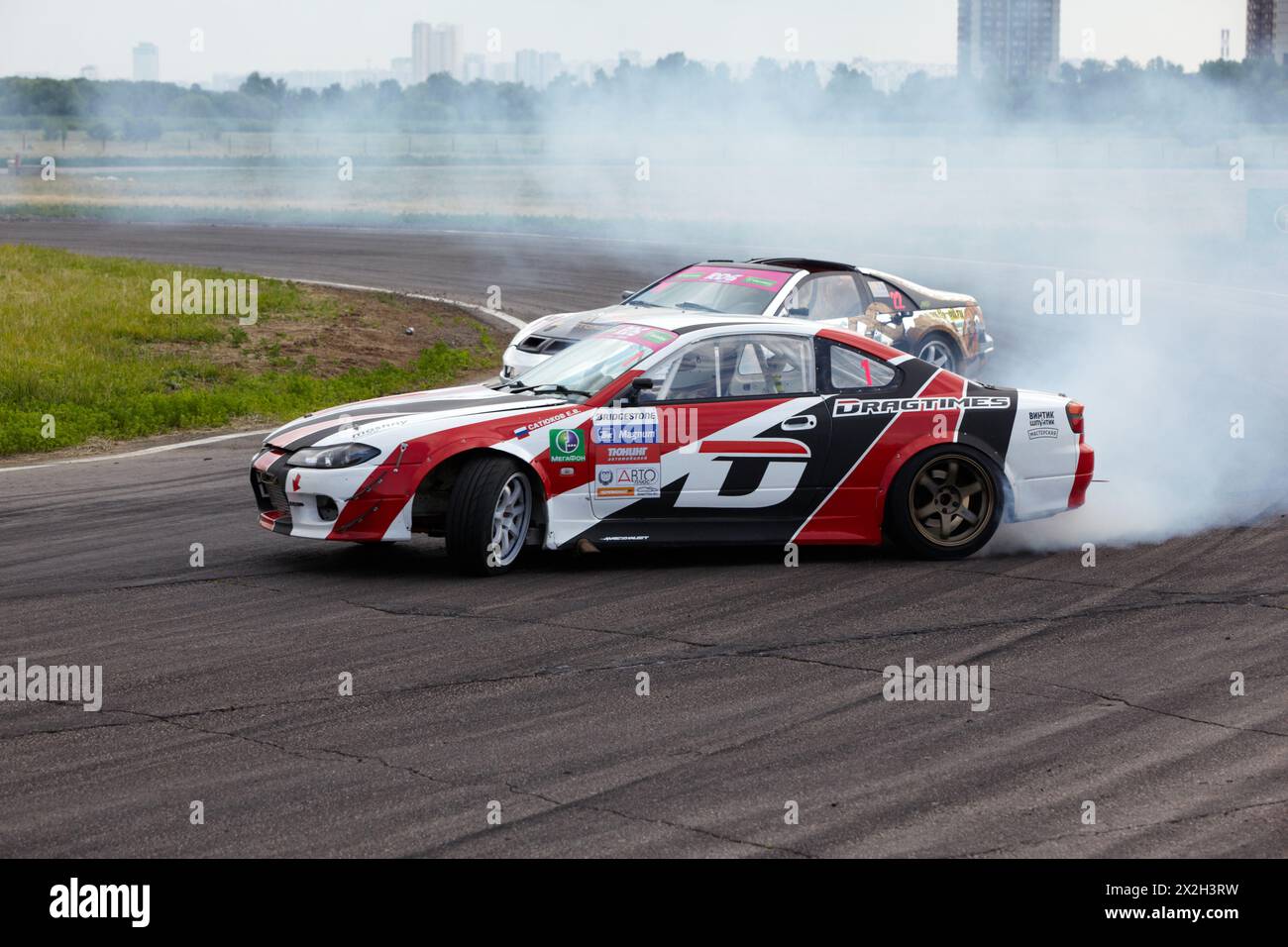 MOSCOW - JUNE 11: Racing car of E.Satyukov in a curve on the track in 3 ...
