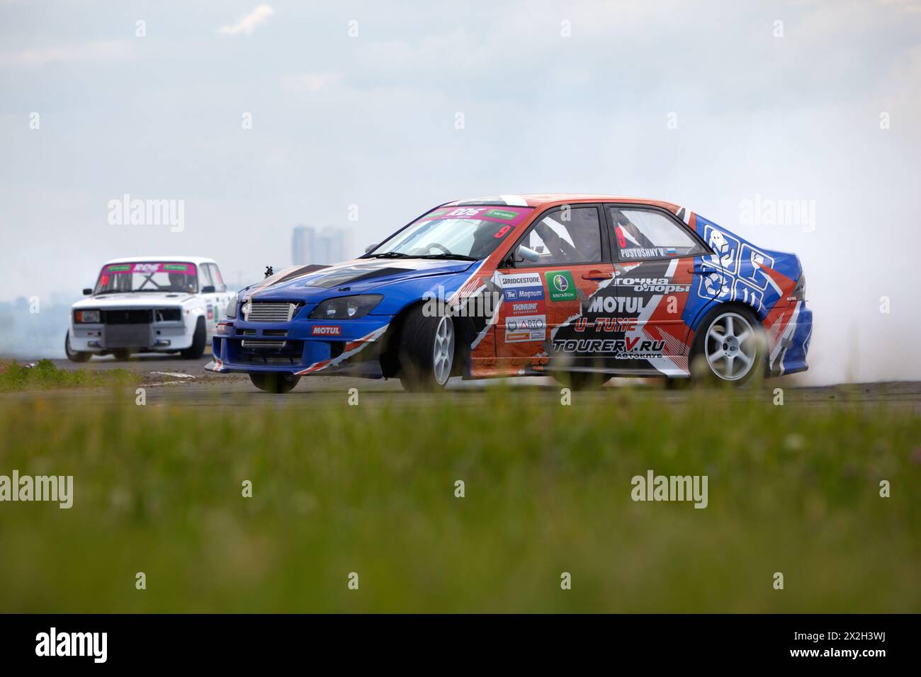 MOSCOW - JUNE 11: Racing car of V.Pustoshny on the track in 3-d tour in ...