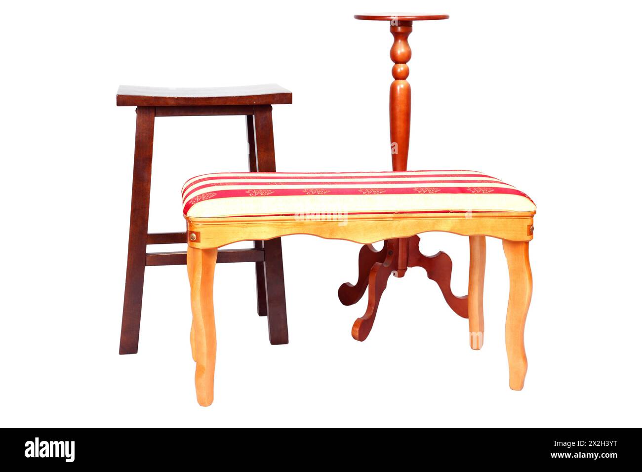 three beautiful different wooden stools stand on white floor Stock ...