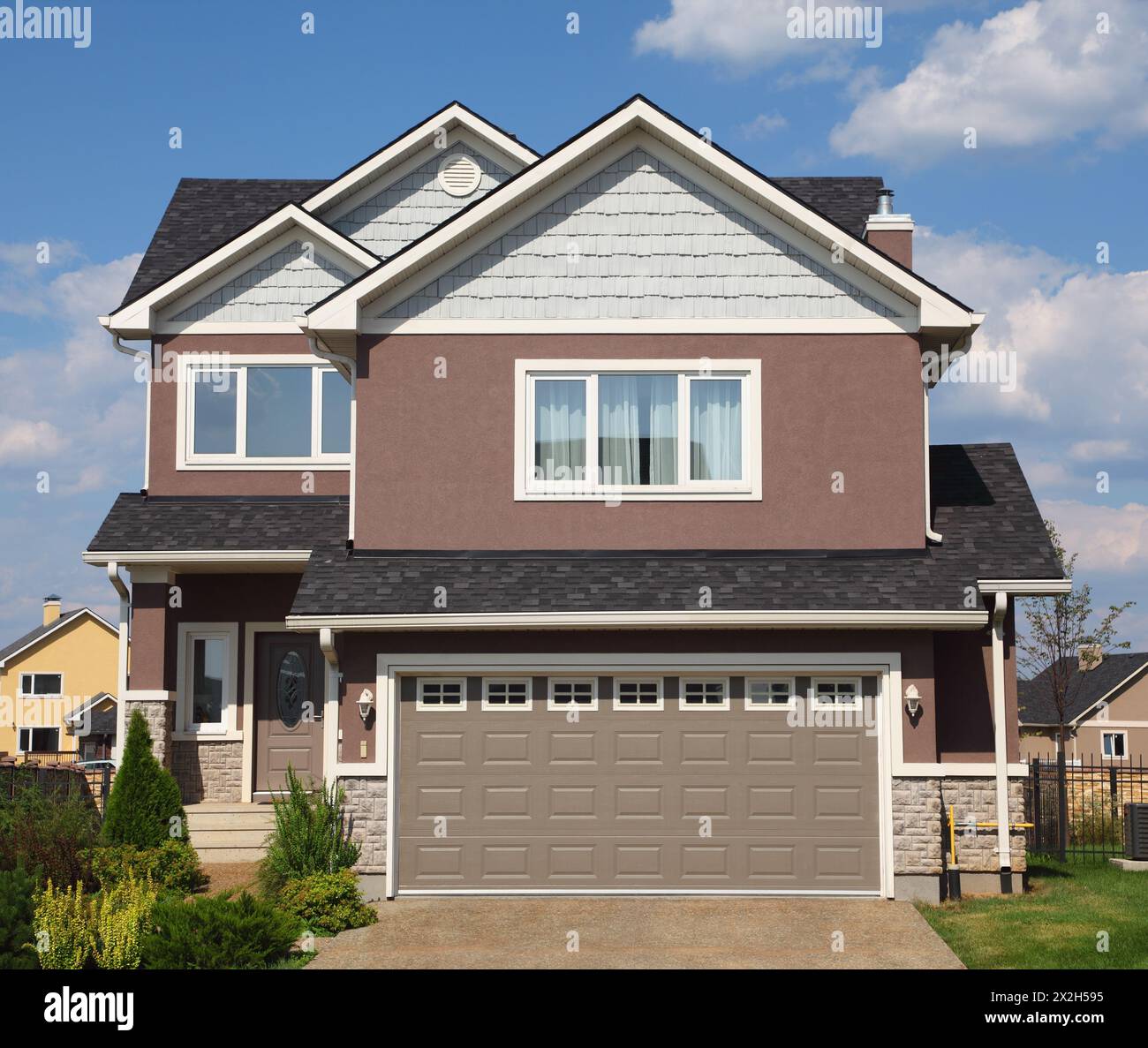 New two-storied white-brown brick cottage with beige garage and white ...