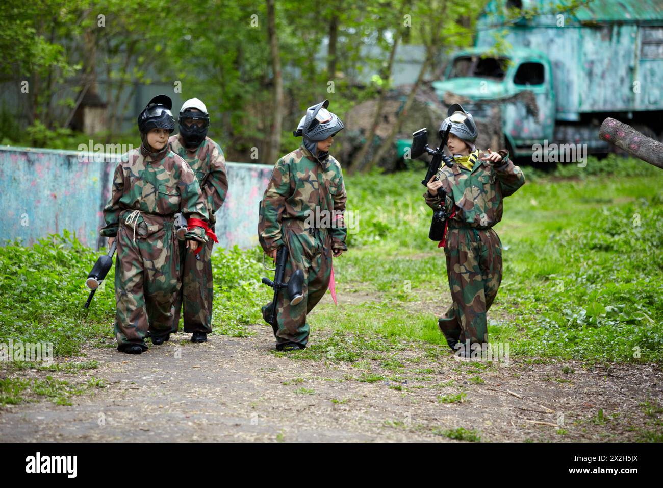 MOSCOW - MAY 14: Boys in camouflage uniforms with markers in their hands go on ground for ...