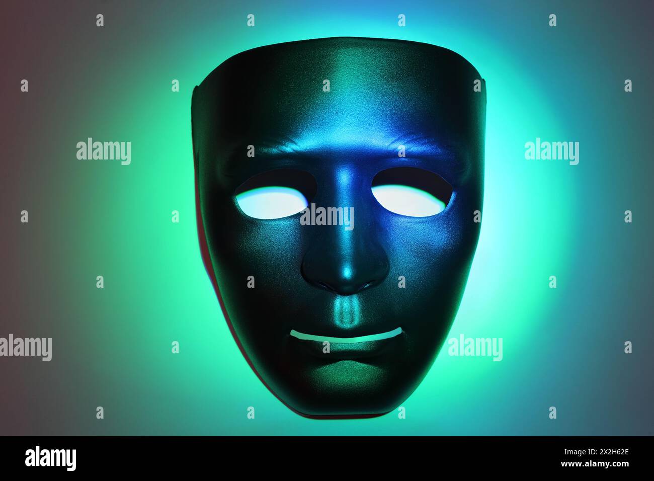 simple black smiling mask, which is green highlighted below Stock Photo ...