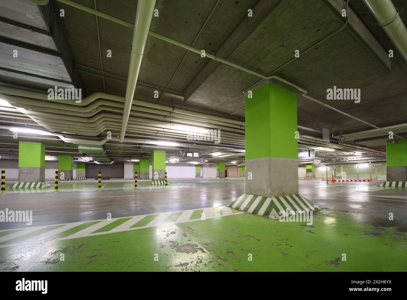 Parking garage of shopping center, underground interior without cars ...