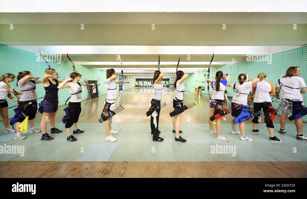 MOSCOW - APRIL 2: Backs of archer girls at Traditional Archery ...