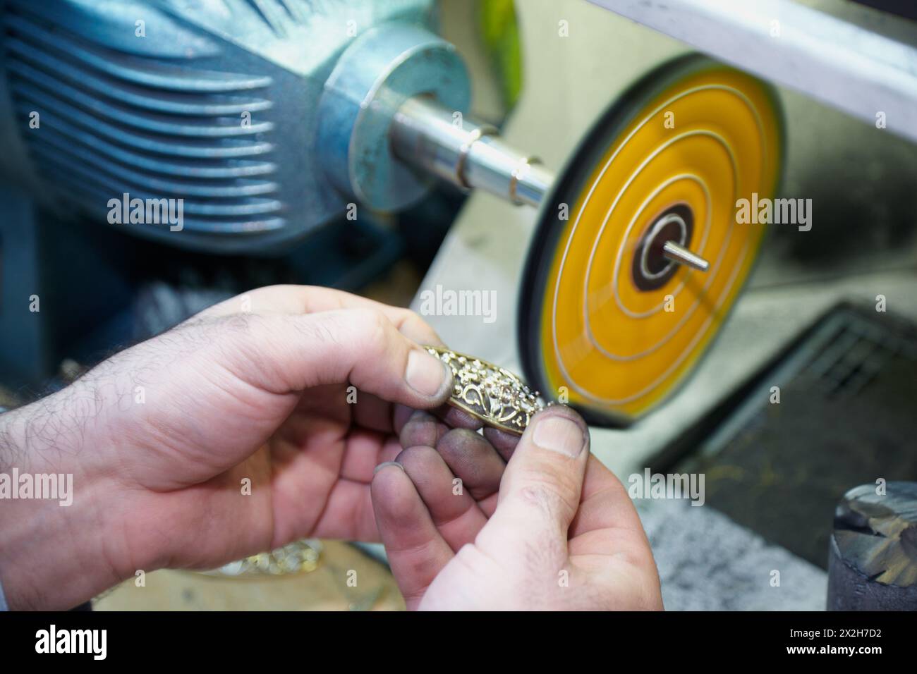 Hand polishing gold jewelry ring hi-res stock photography and images ...