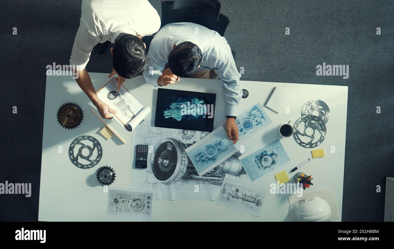 Top down aerial view of manager sitting while answer question about jet ...