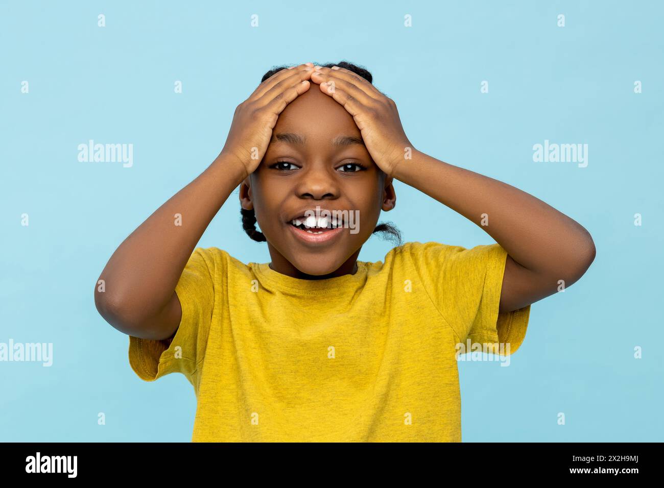 Surprised dark- skinned little boy rejoicing something pleasant Stock ...