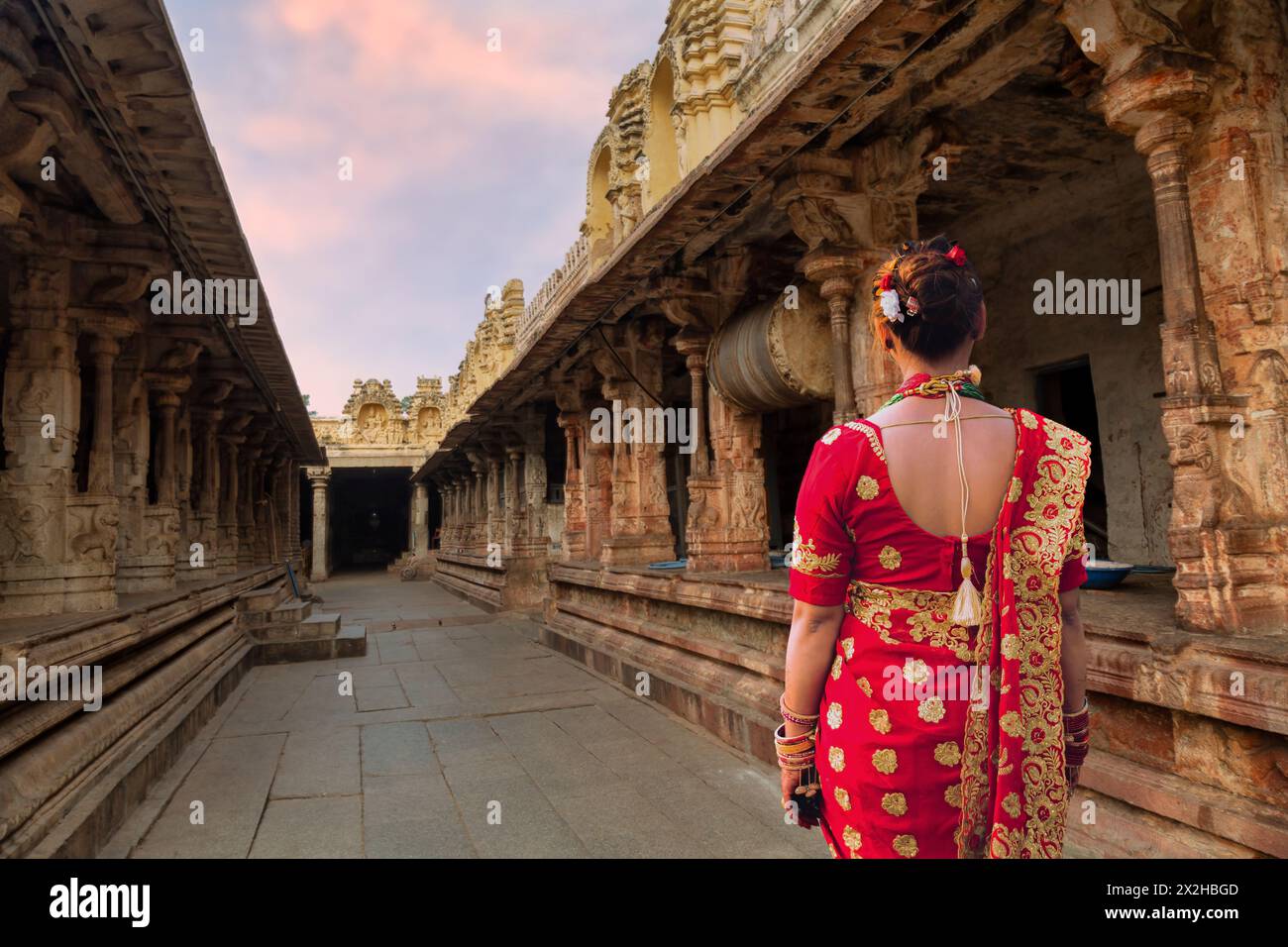 Newly married Indian woman in red saree at Virupaksha temple ancient ...
