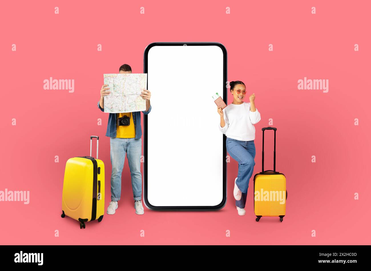 Travelers hiding behind map and phone, pink background Stock Photo - Alamy