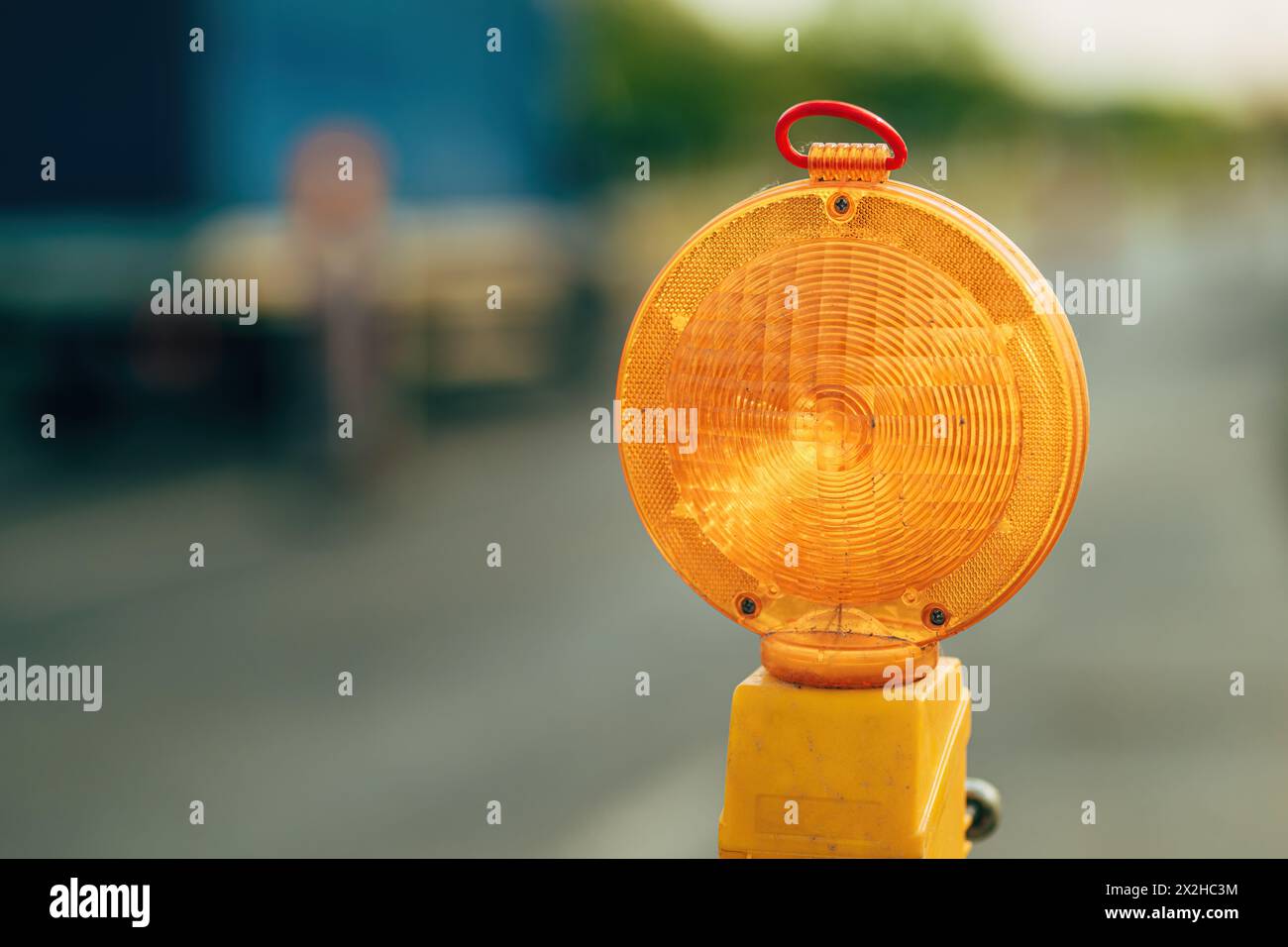 Traffic beacon warning light during road maintenance, selective focus ...