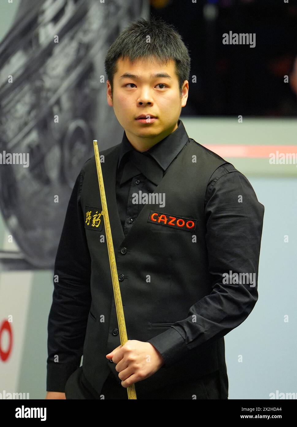Pang Junxu in action against Robert Milkins (not pictured) on day three ...