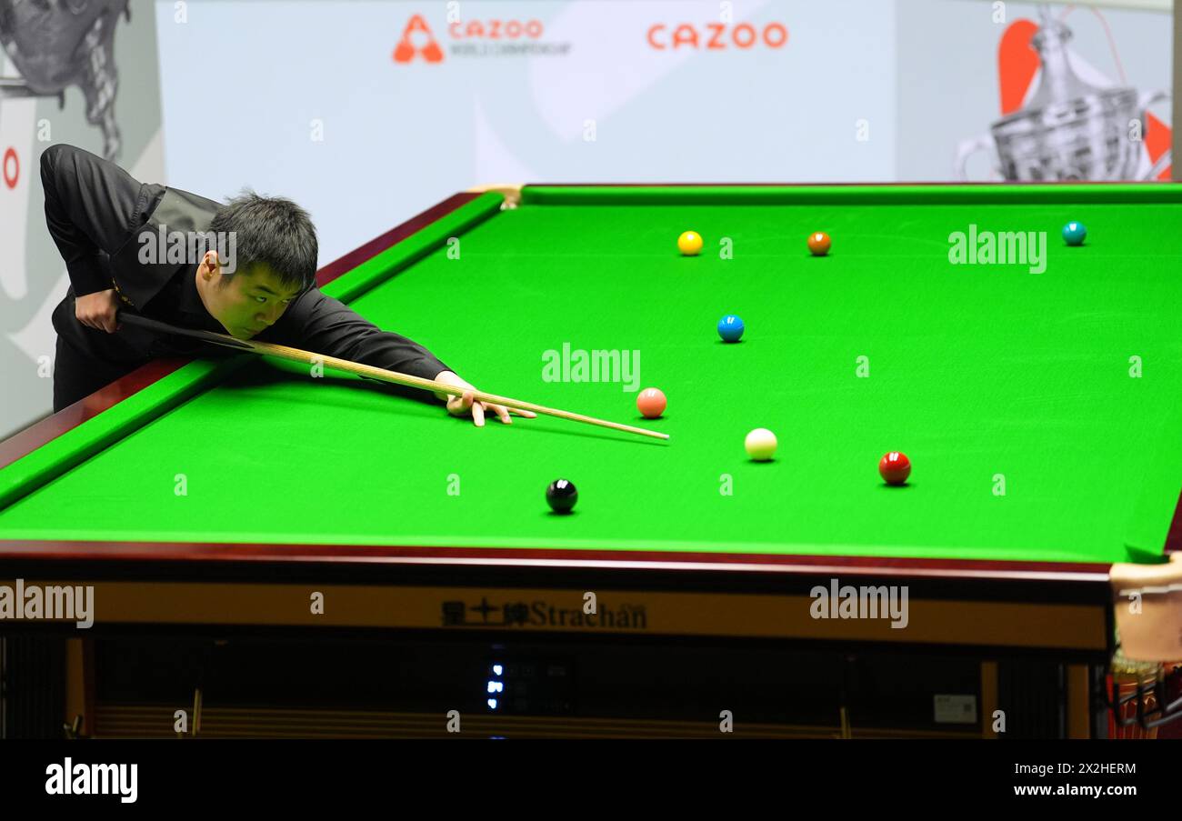 Pang Junxu in action against Robert Milkins on day three of the 2024 ...
