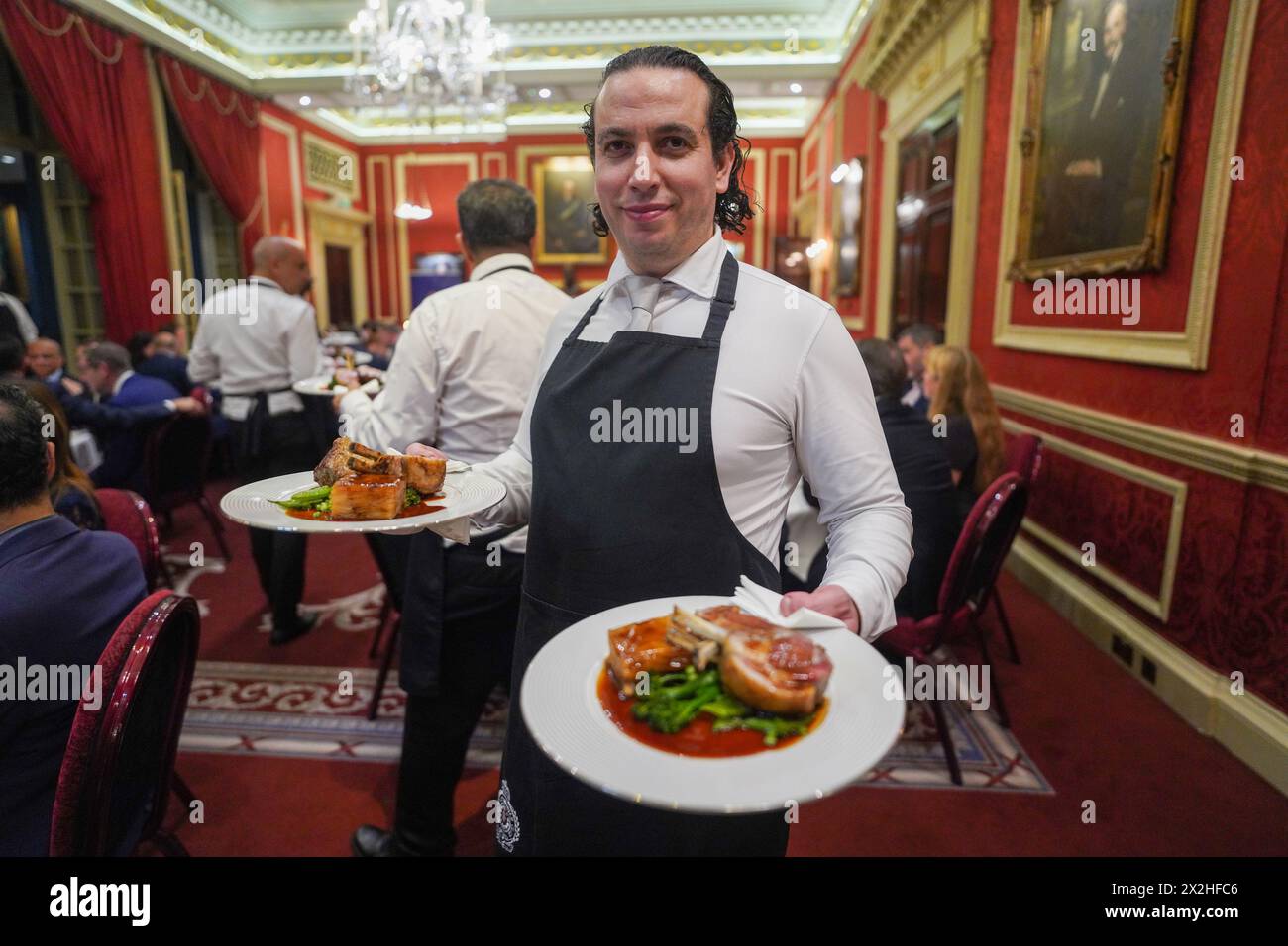 A waiter serving food at the RAC Club. Photo date: Tuesday, September ...
