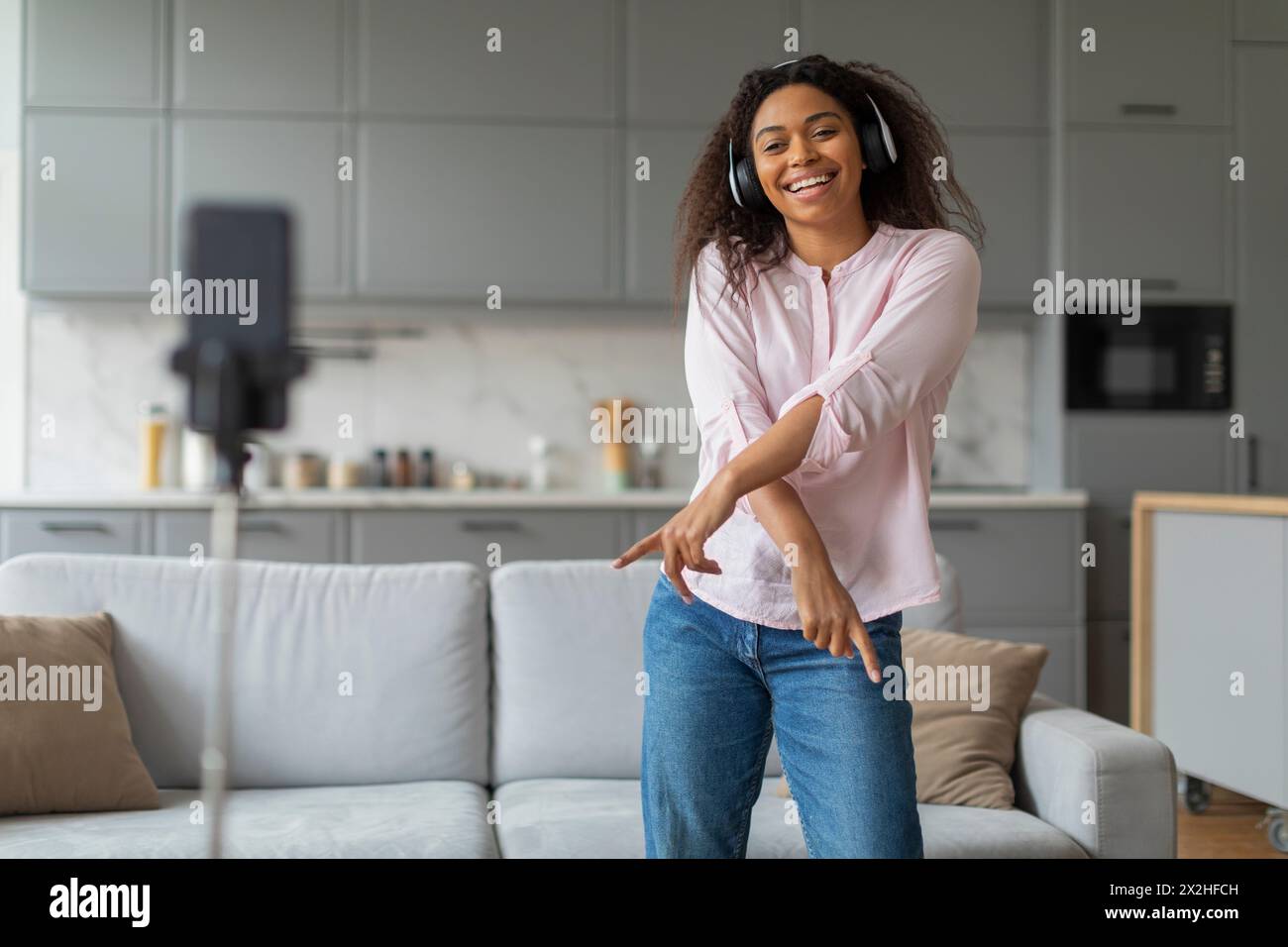 Live streaming vlogging african american hi-res stock photography and ...