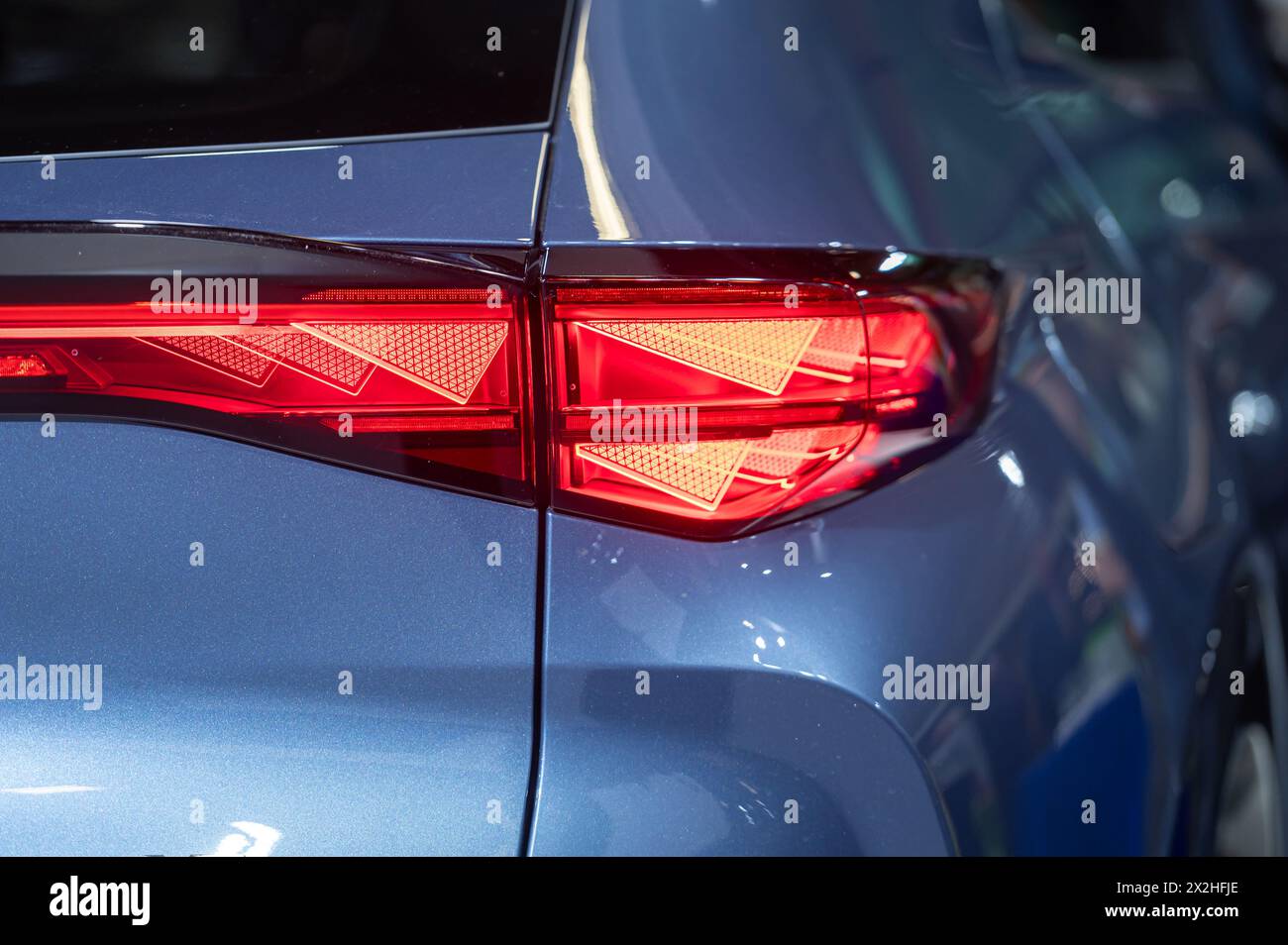 Riga, Latvia, April 19, 2024: rear LED lights closeup of nev Cupra ...