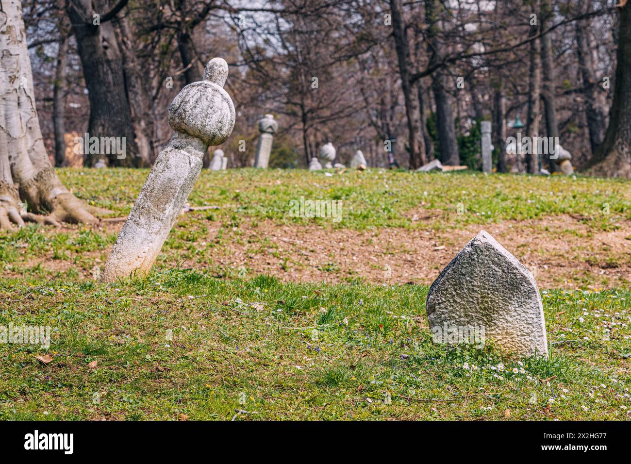 Historic pillars and muslim tombstones in the graveyard, a poignant ...