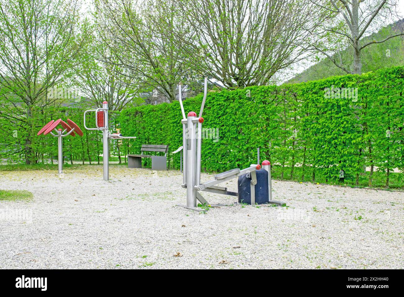 Fitness corner with equipment outside, under the open sky. Gym machines ...