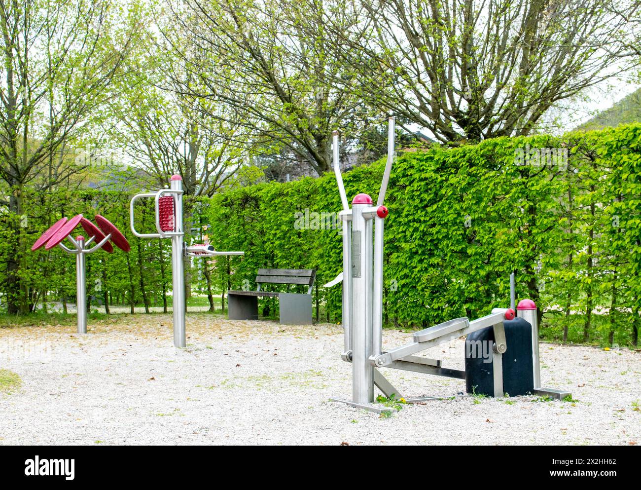Fitness corner with equipment outside, under the open sky. Gym machines ...