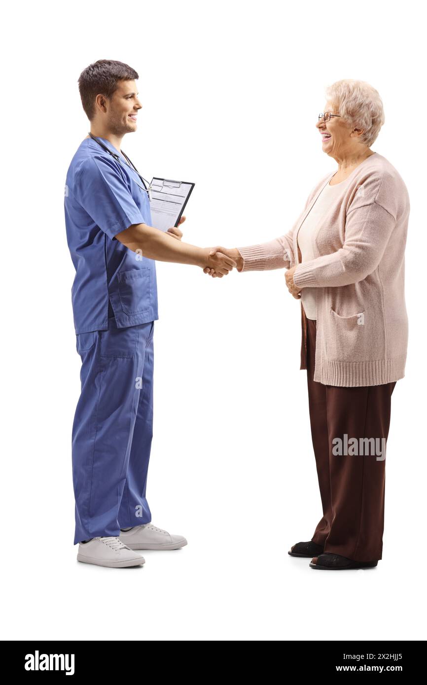 Full length profile shot of an elderly woman and a health care worker ...