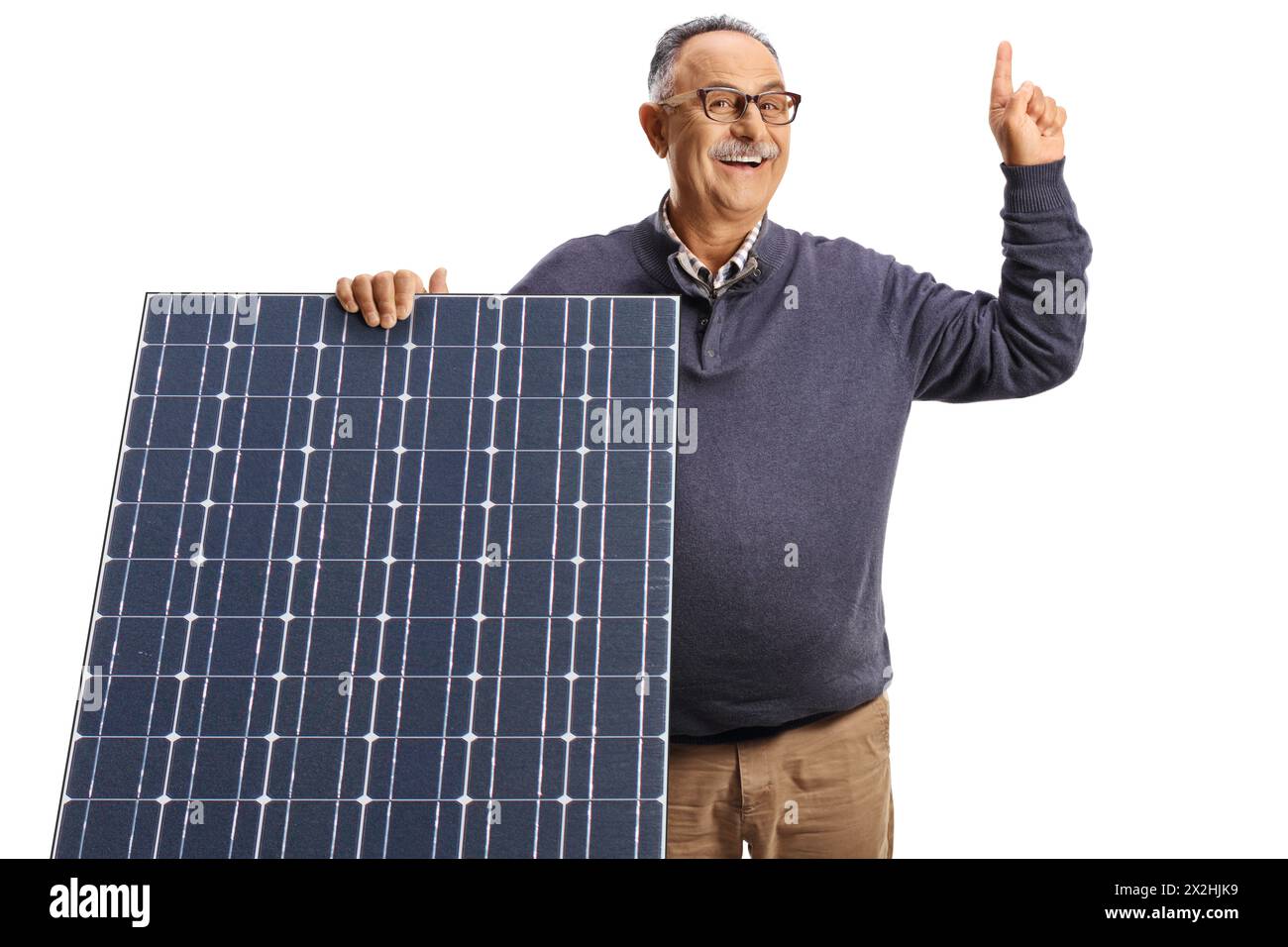 Mature man behind a solar panel smiling and pointing up isolated on ...