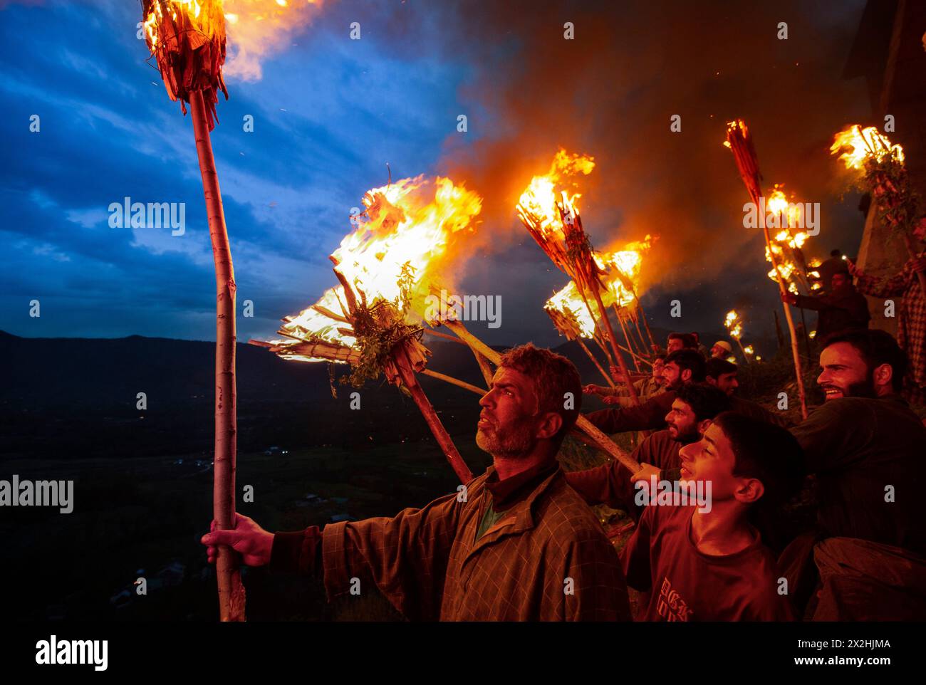 Srinagar, Indian-controlled Kashmir. 22nd Apr, 2024. Villagers hold ...