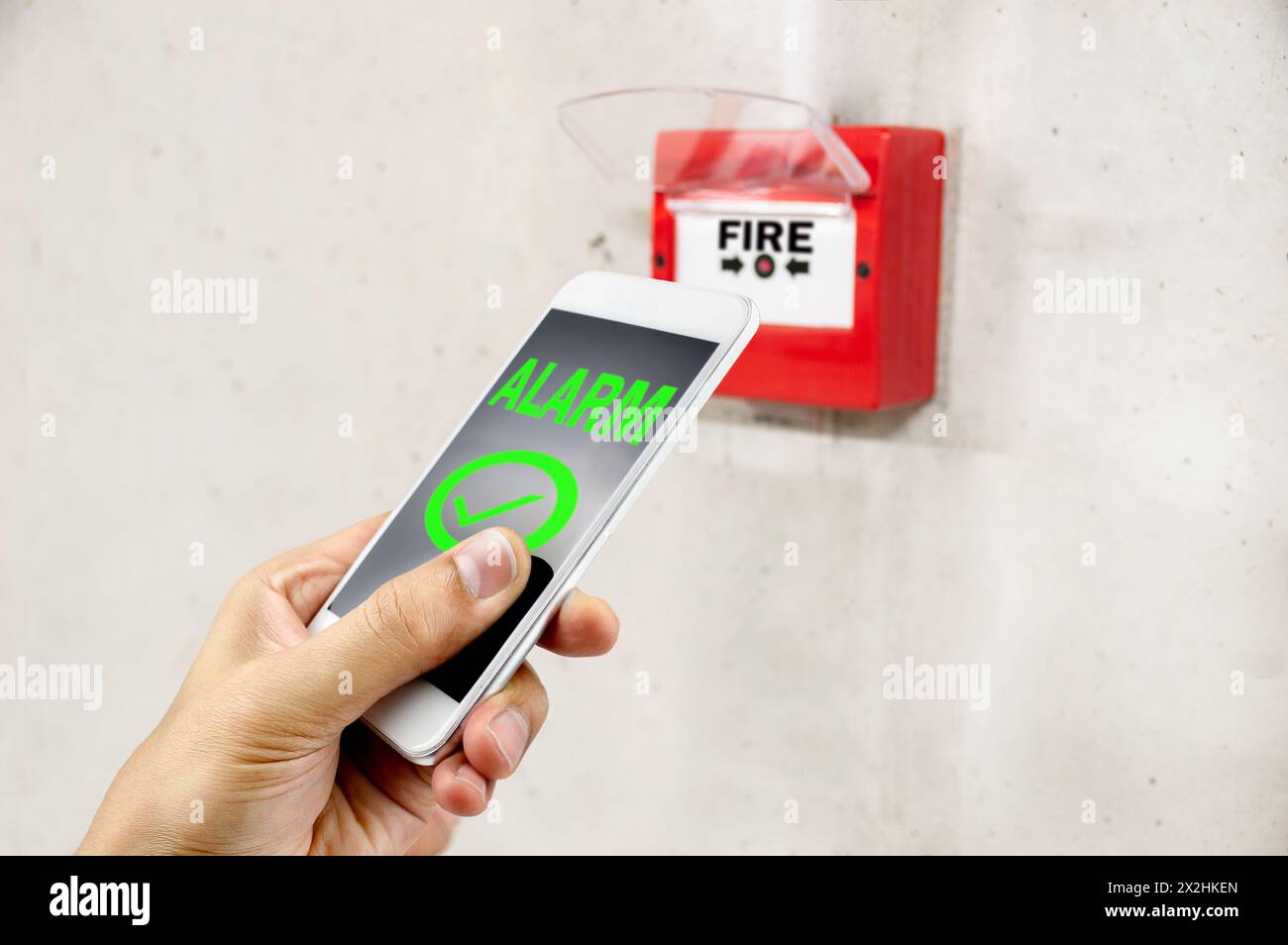 Hand activating fire alarm system hi-res stock photography and images ...