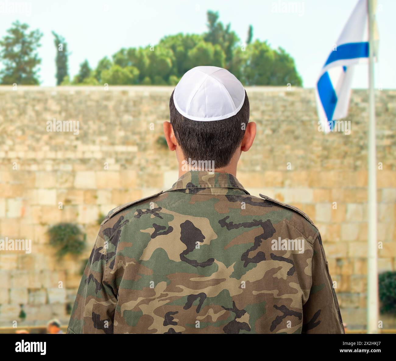 rear view of a jewish soldier in front of the Western Wall, Wailing ...