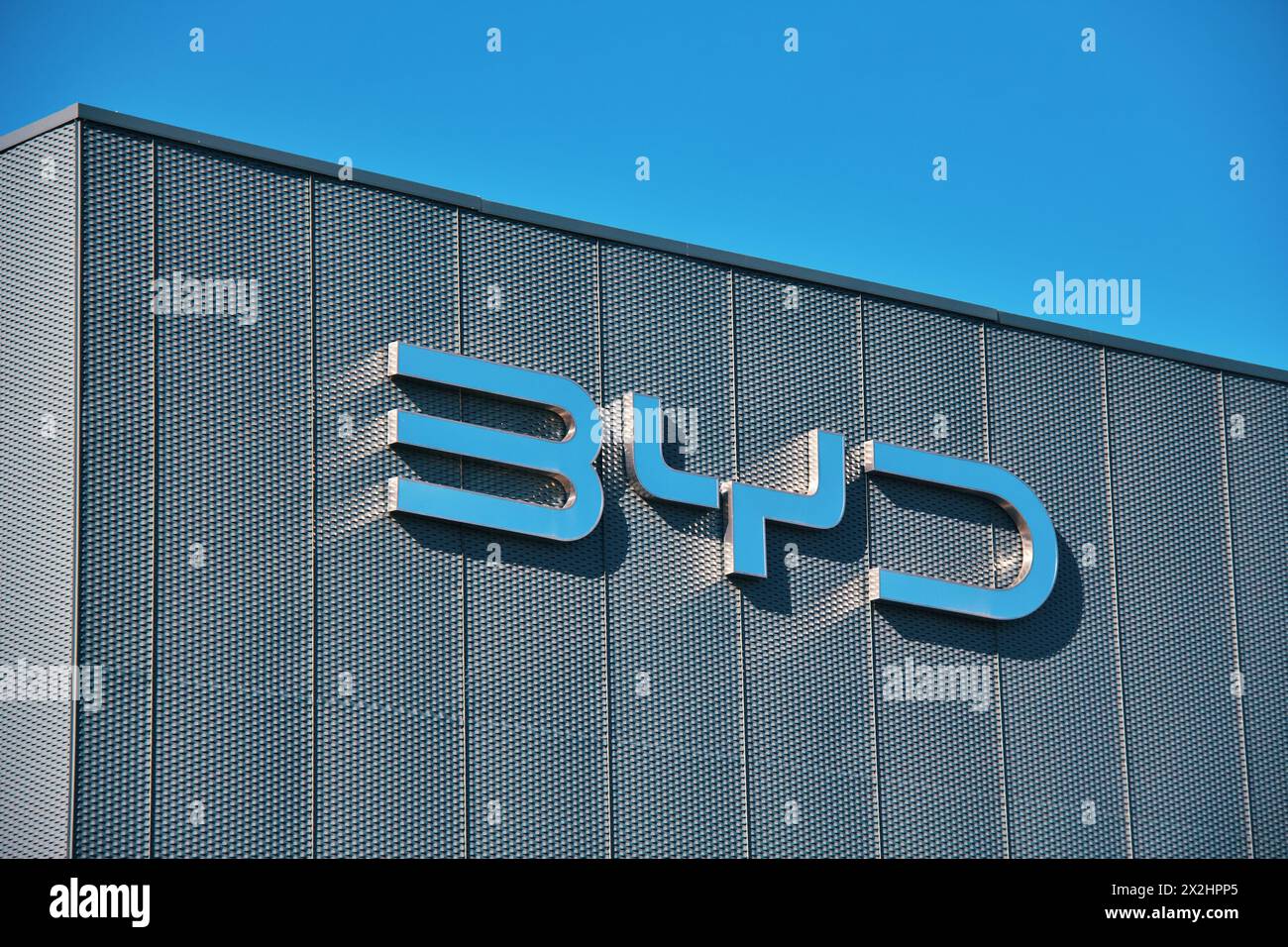 Pole billboard with logo BYD on blue sky backgroundApril 20th 2024 ...