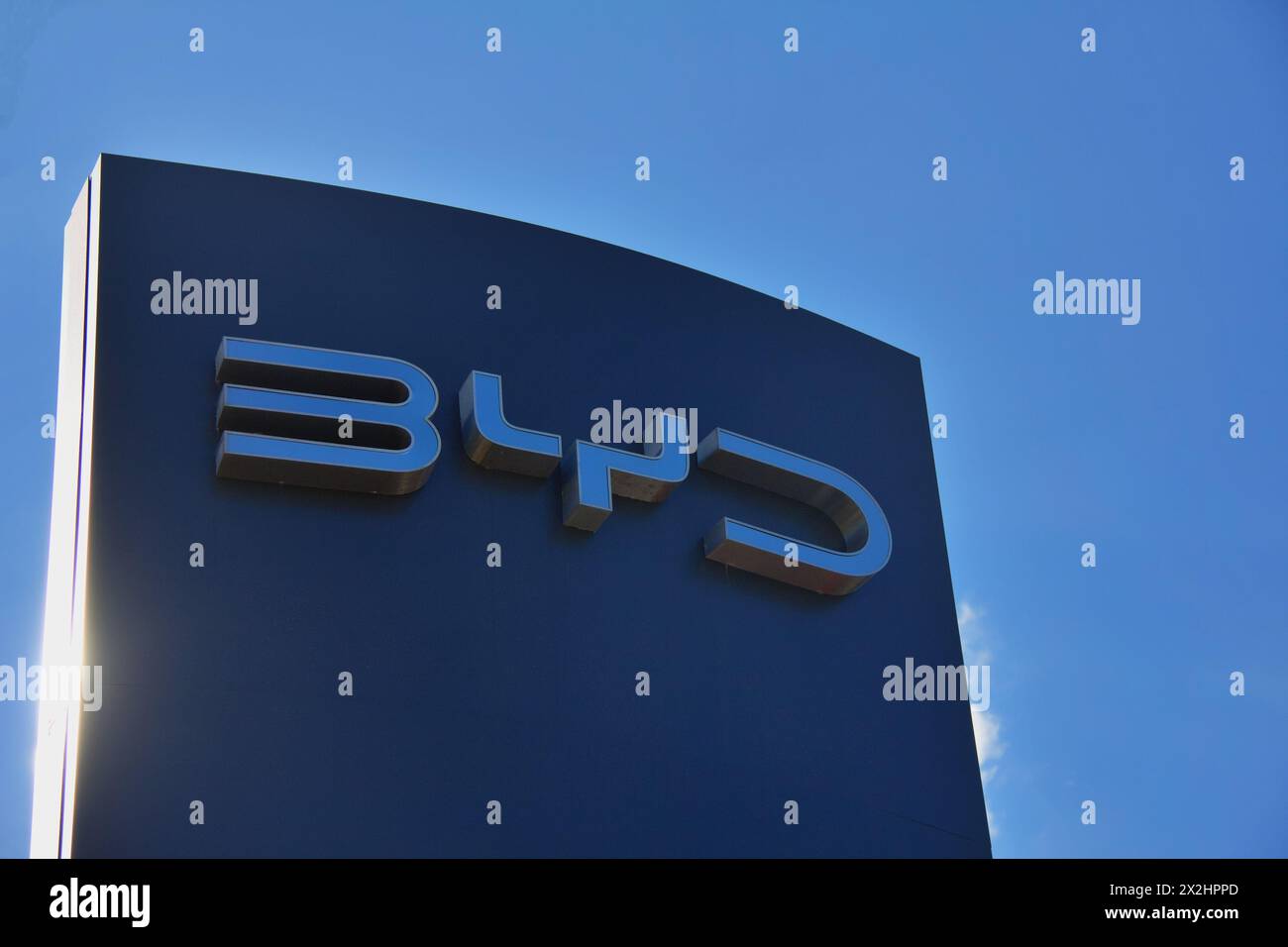 Pole billboard with logo BYD on blue sky backgroundApril 20th 2024 ...