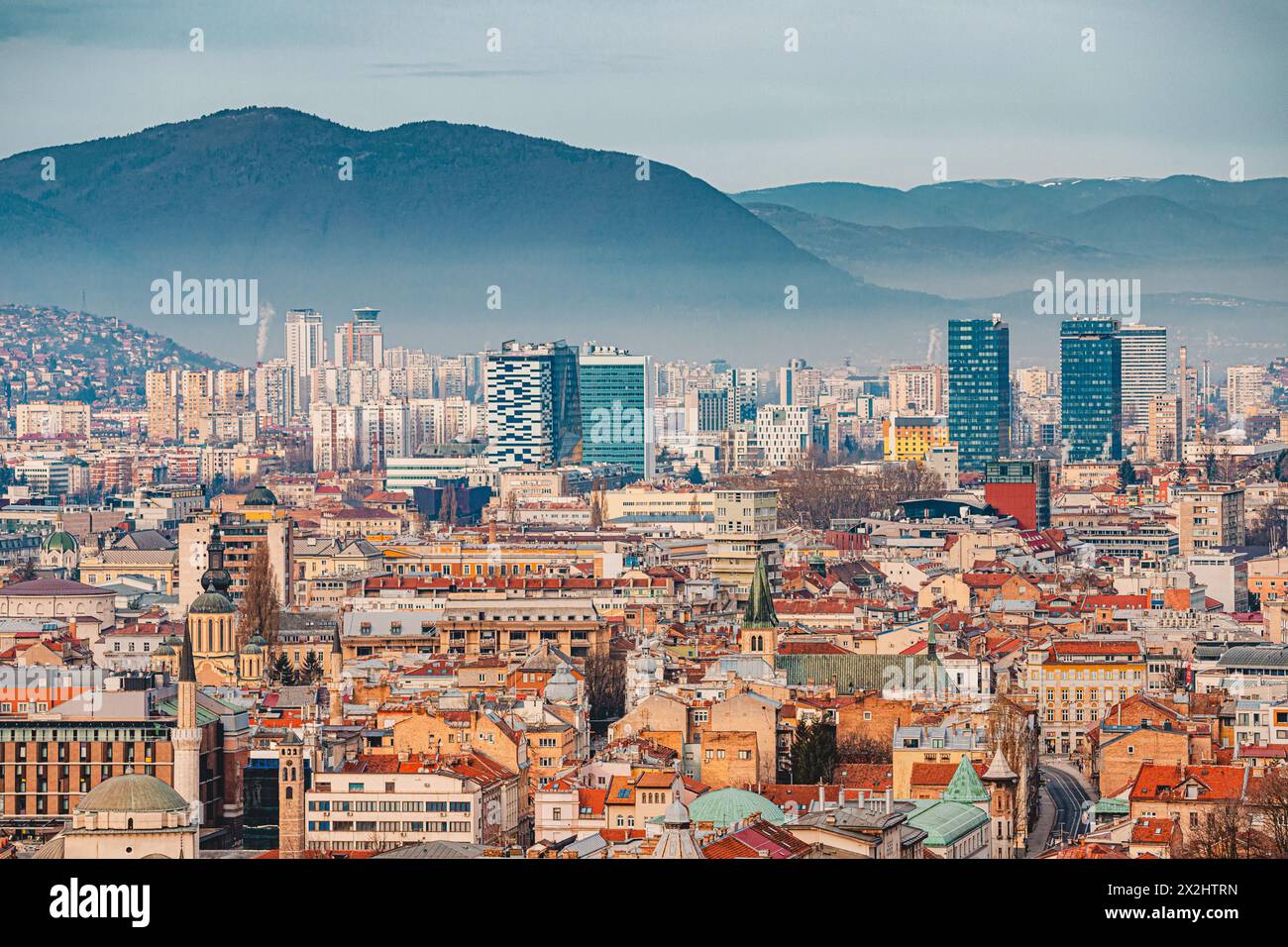 Sarajevo's enchanting cityscape, nestled amidst rolling hills, captures ...
