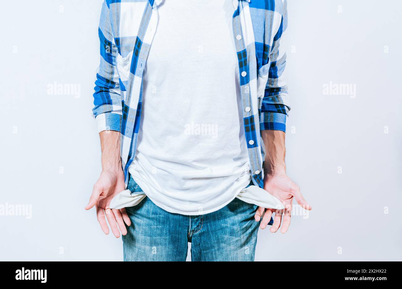 Person showing his empty pockets. Concept of financial problems Stock ...