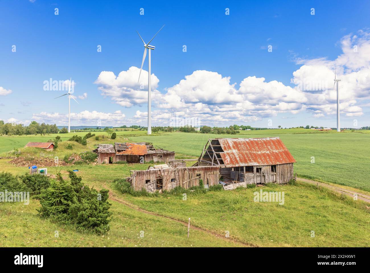 Landscape view at an old barn ruins in the countryside with high wind ...