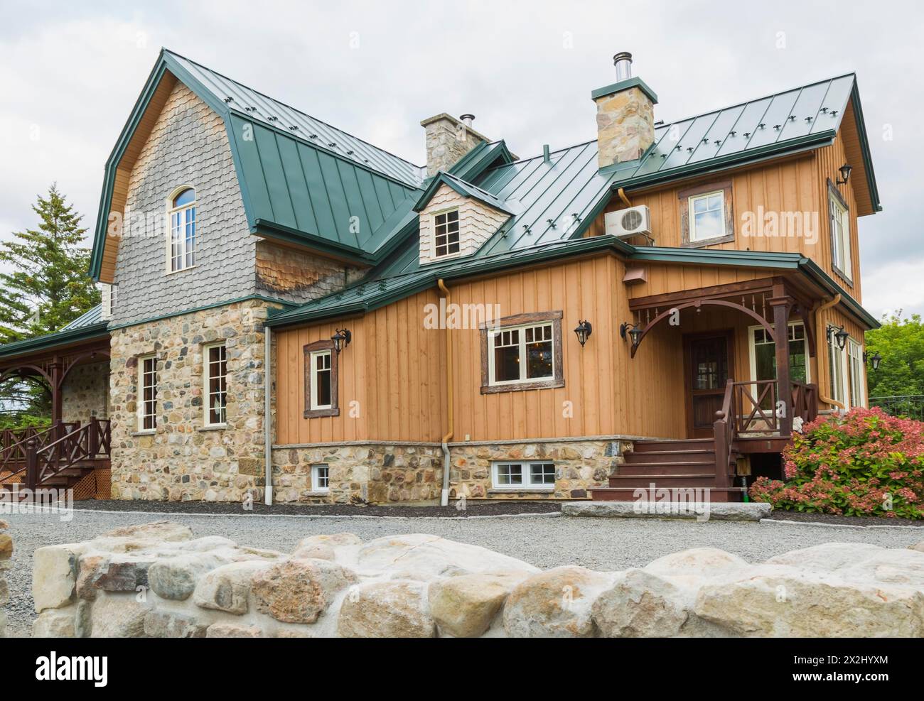 Old 1826 Canadiana cottage style fieldstone house facade with vertical ...