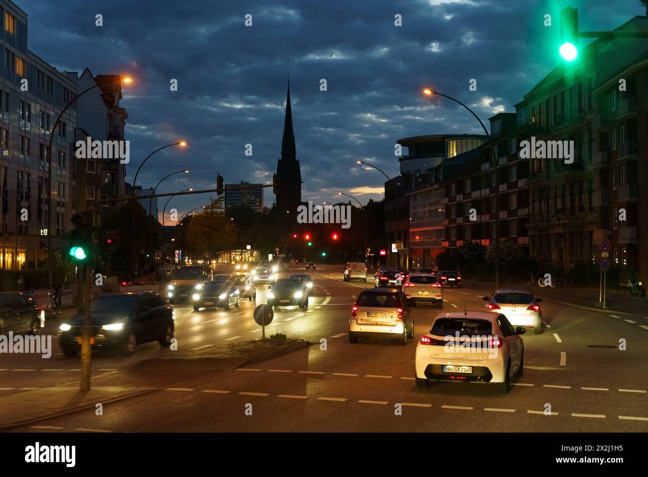 Hamburg, Germany - May 19, 2023: A city street at night filled with ...