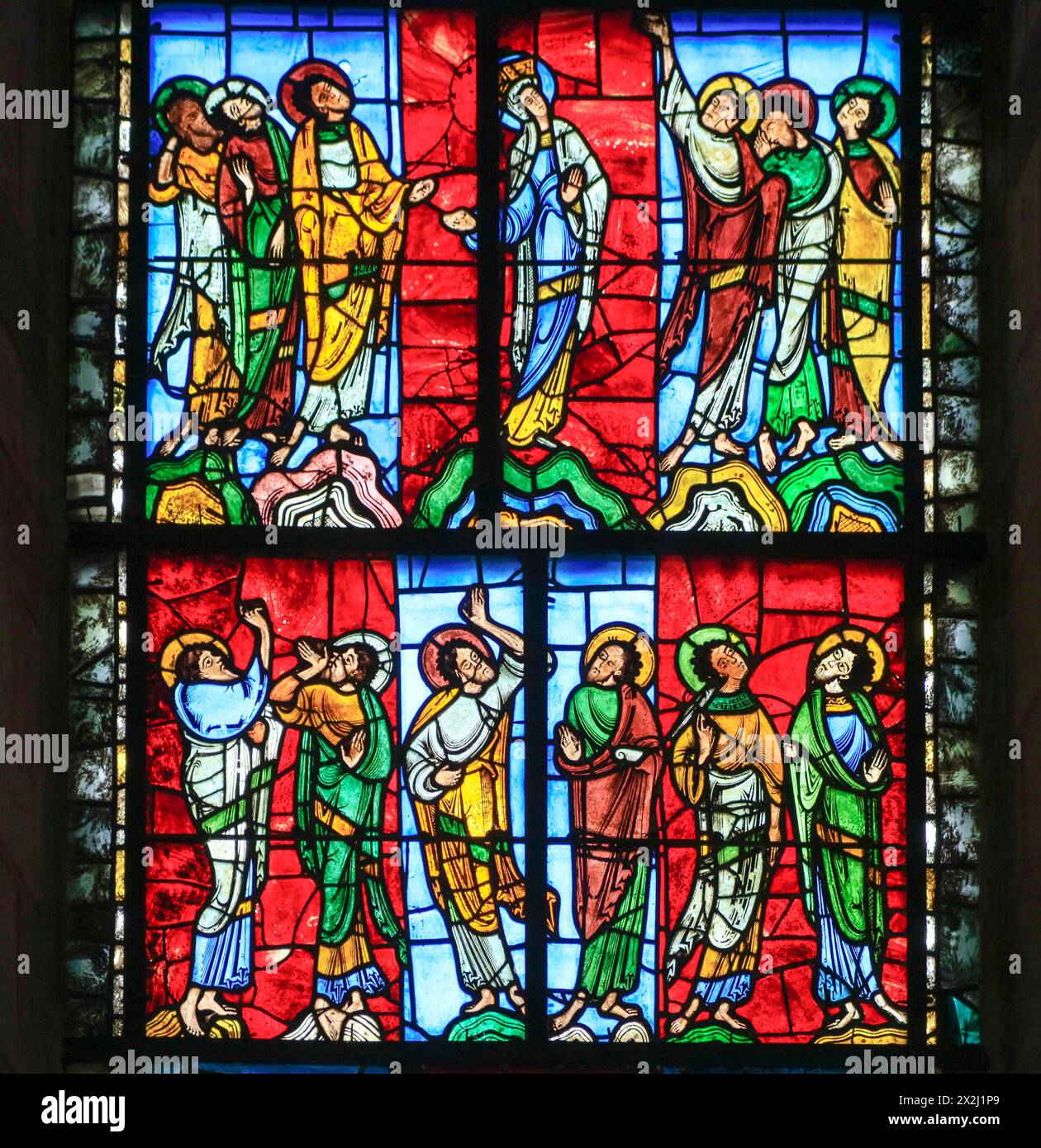 Romanesque stained glass window of the nave, motif of the Assumption ...