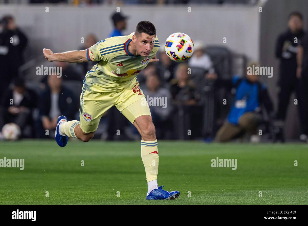New York Red Bulls defender Sean Nealis (15) heads the ball during a ...