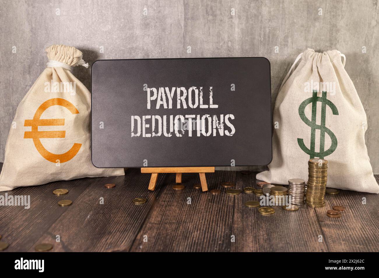 Selective focus. Calculator,pencil and banknotes with the word Payroll ...