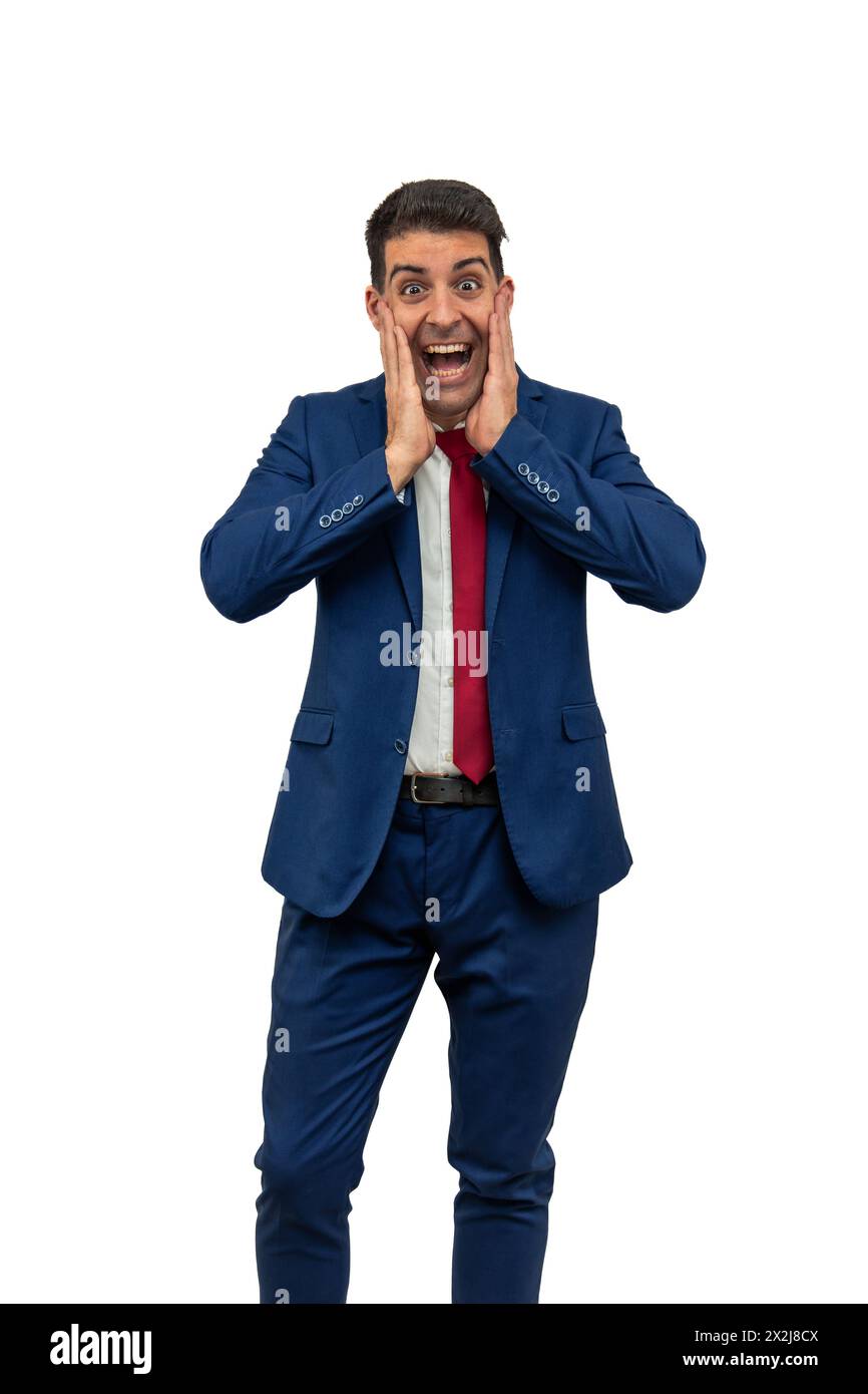 vertical businessman as he holds his hands to his face, expressing joy ...
