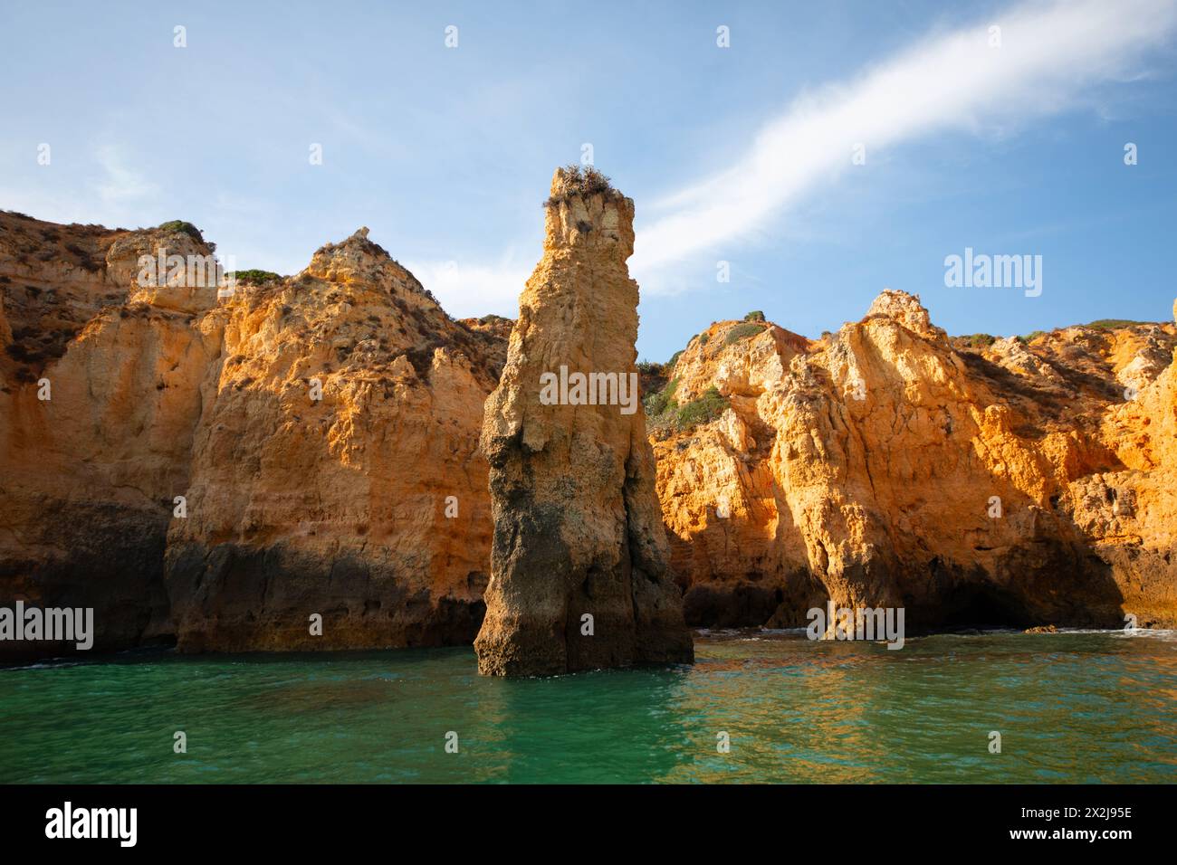 stunningly beautiful rocks in ocean near coast of Algarve in Portugal ...