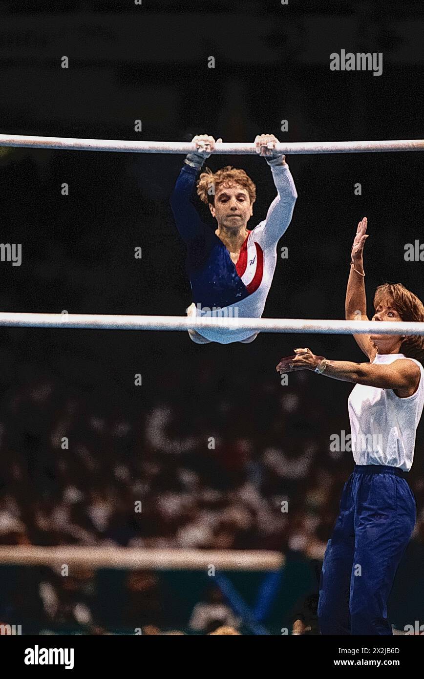 Kerri Strug (USA) competing on the uneven bars in the women's artistic ...