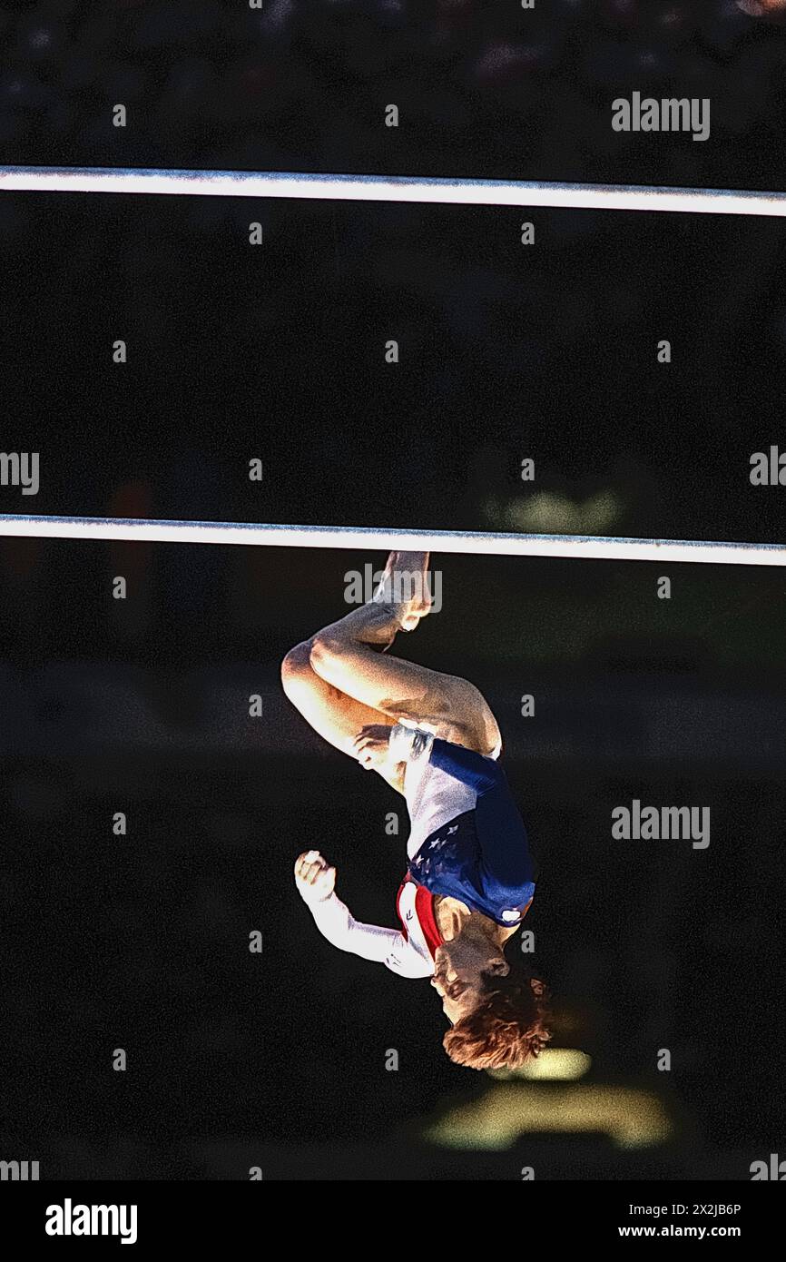 Kerri Strug (USA) competing on the uneven bars in the women's artistic ...