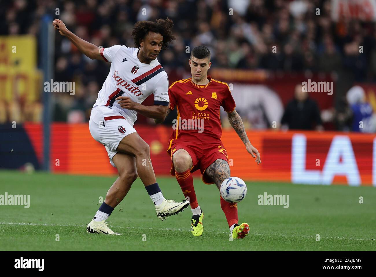 Bologna's Dutch forward Joshua Zirkzee challenges for the ball with ...